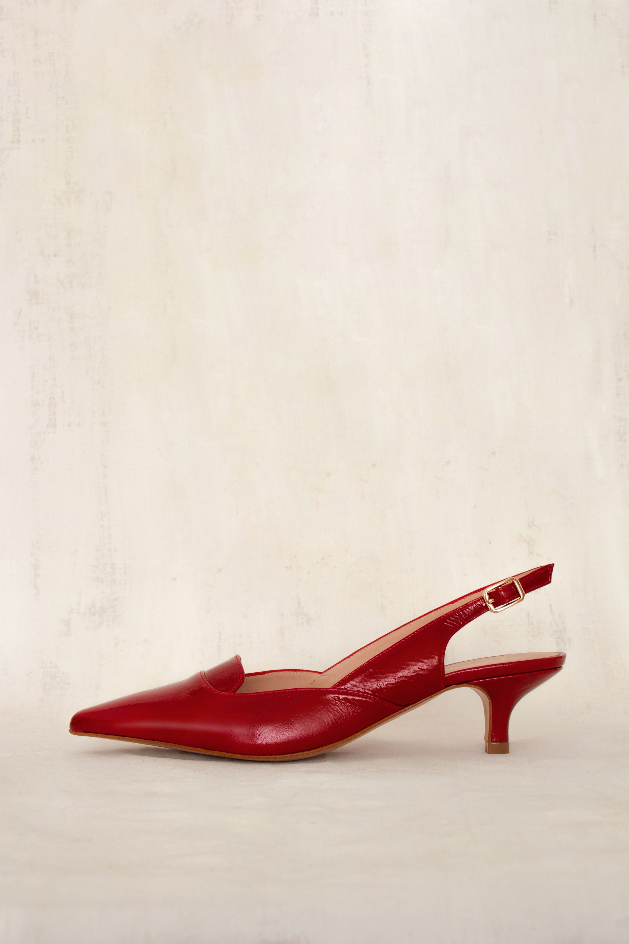 Cleo red low heel court shoe